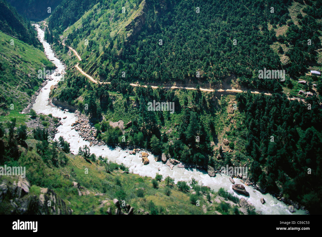 Baspa river and parallel mountain road Himachal Pradesh India Stock ...
