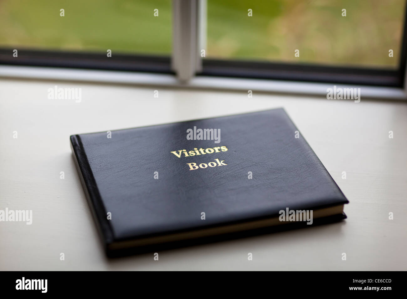 Visitor's book on a window sill Stock Photo - Alamy