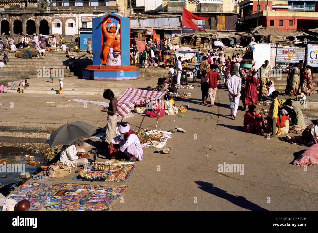 Hawkers on ghat of river Godavari ; Panchavati ; Nasik ; Maharashtra ...