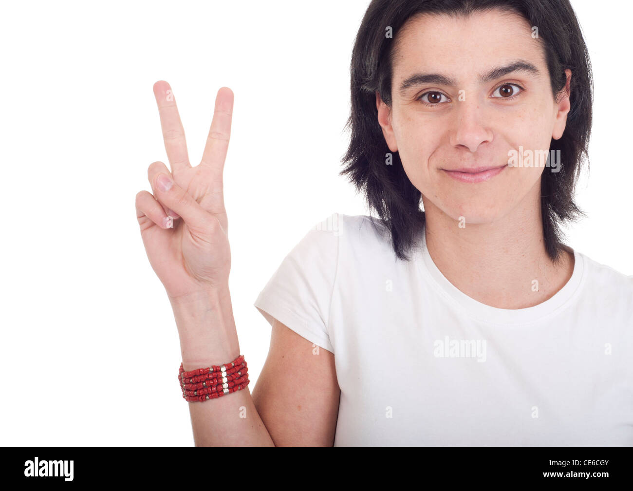 Woman showing victory sign Stock Photo - Alamy