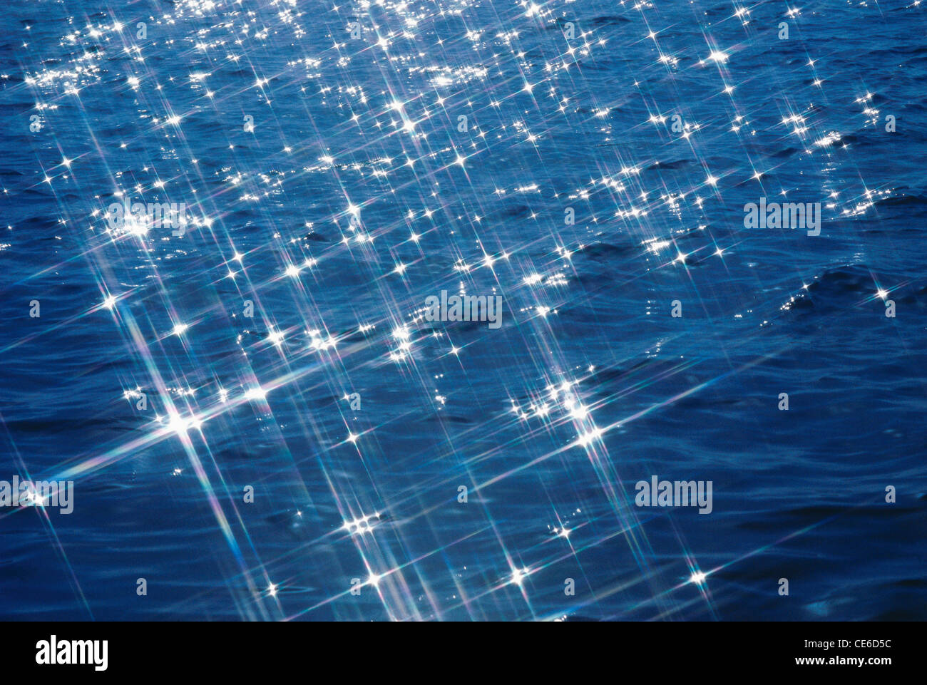 Sun sparkling in water Stock Photo - Alamy