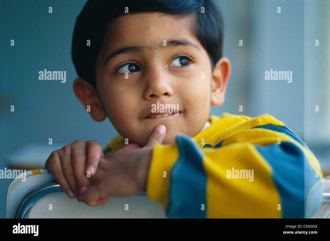 boy thinking looking up MR Stock Photo - Alamy