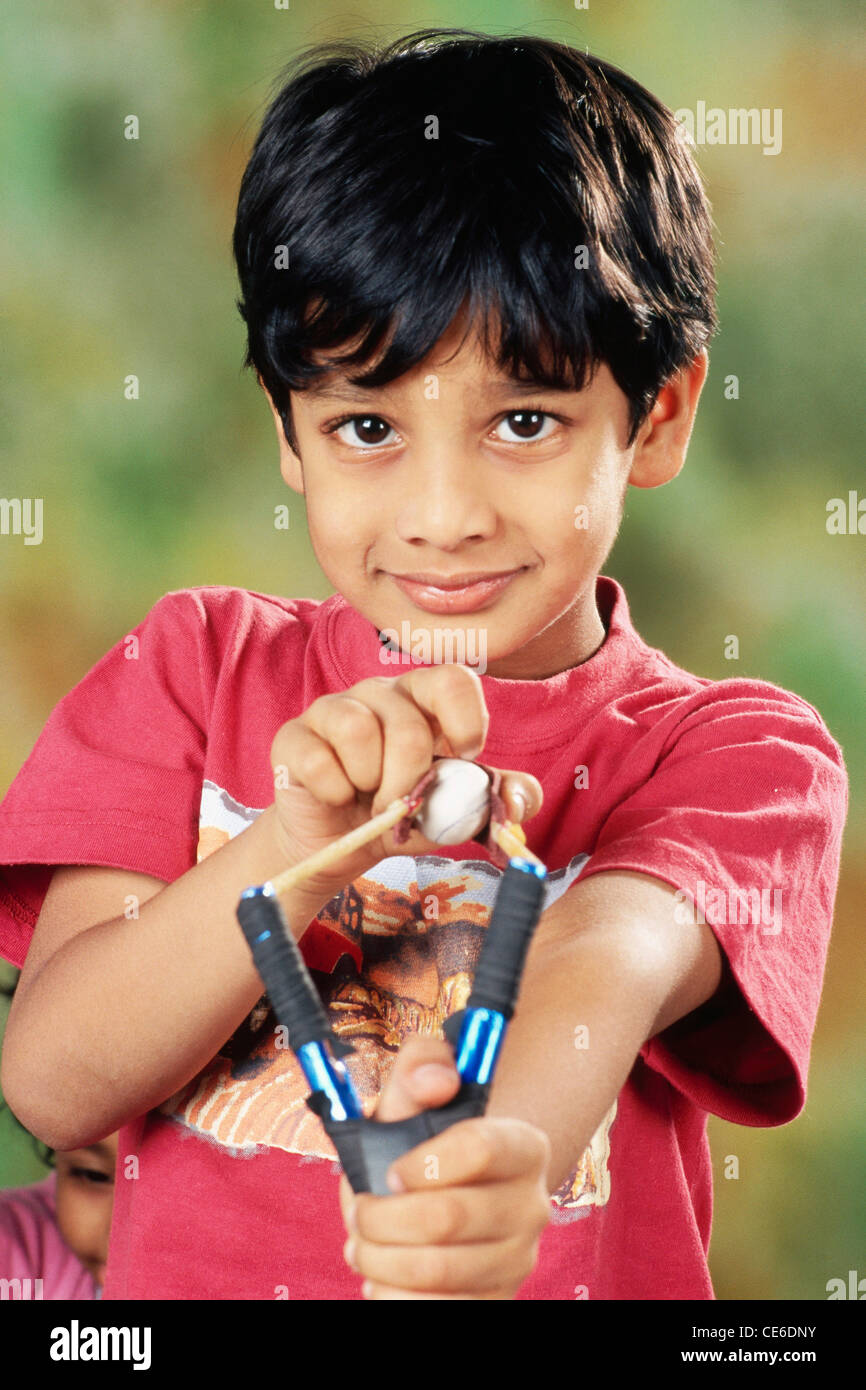 Boy with catapult hi-res stock photography and images - Alamy