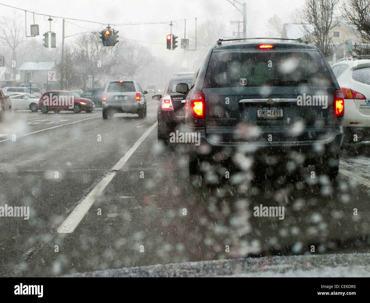 Vehicle traffic in rain storm Stock Photo - Alamy