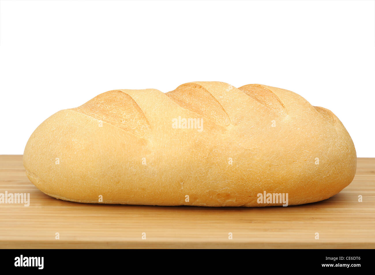 Bread long loaf on a chopping board. It is isolated on a white ...