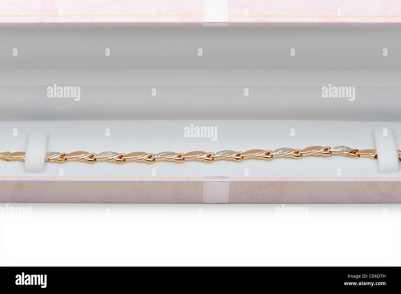 Gold bracelet in gift packing. It is isolated on a white background ...