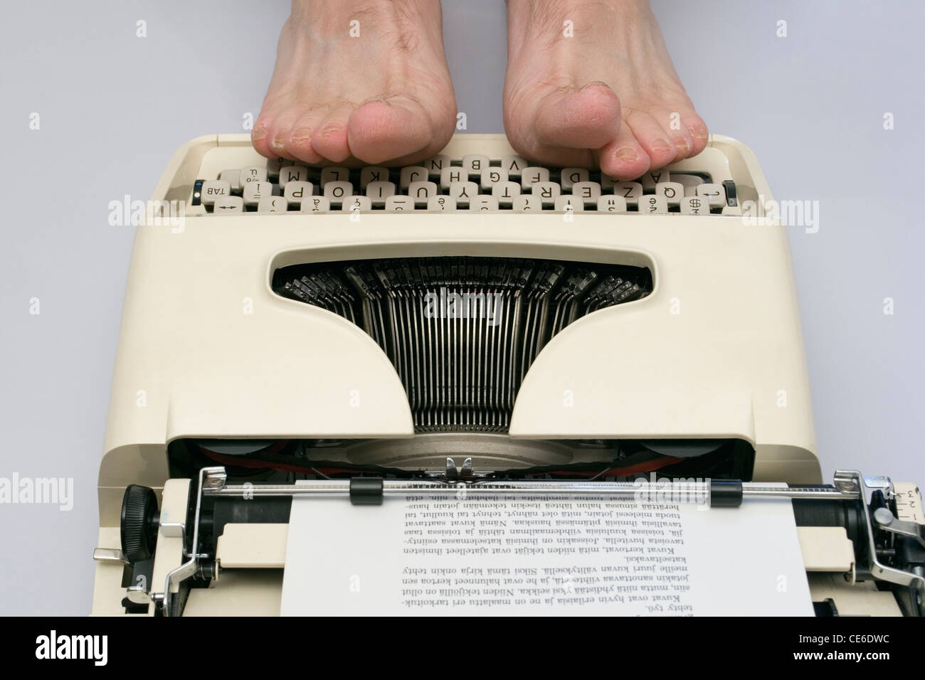 Typewriting with feet Stock Photo - Alamy