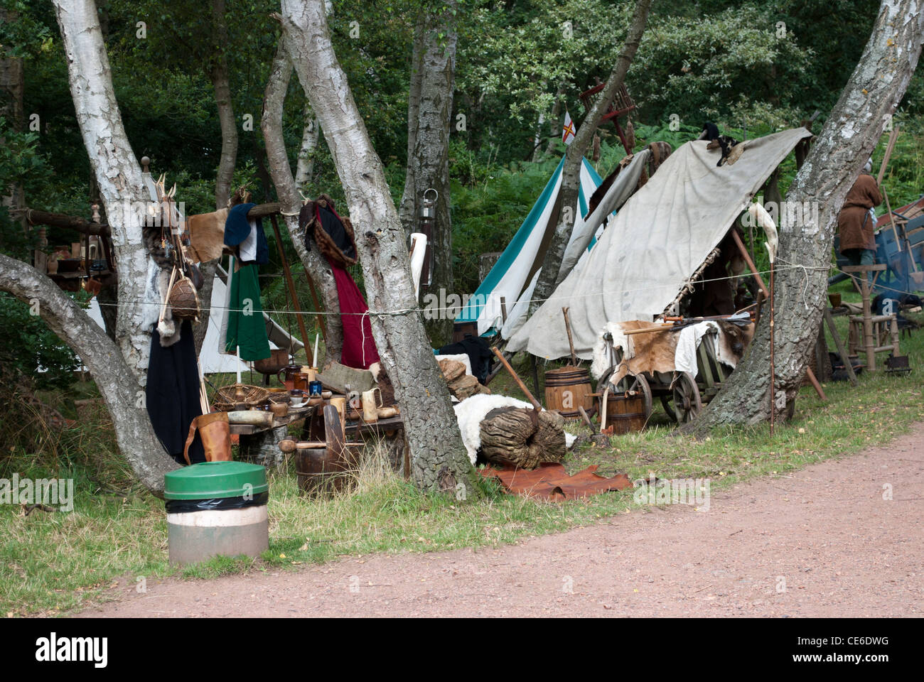 Medieval camping site with lean-tos and furs on display Stock Photo - Alamy