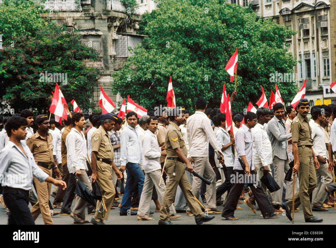 Men protesting demonstration red flags on roads of Mumbai India Stock ...