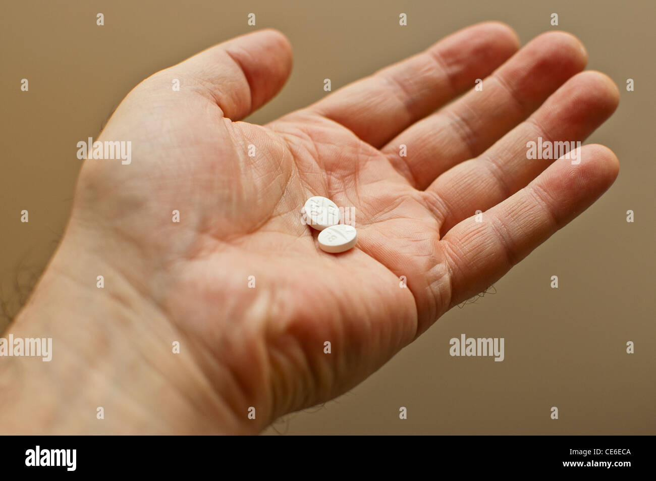 Hand holding tablets hi-res stock photography and images - Alamy