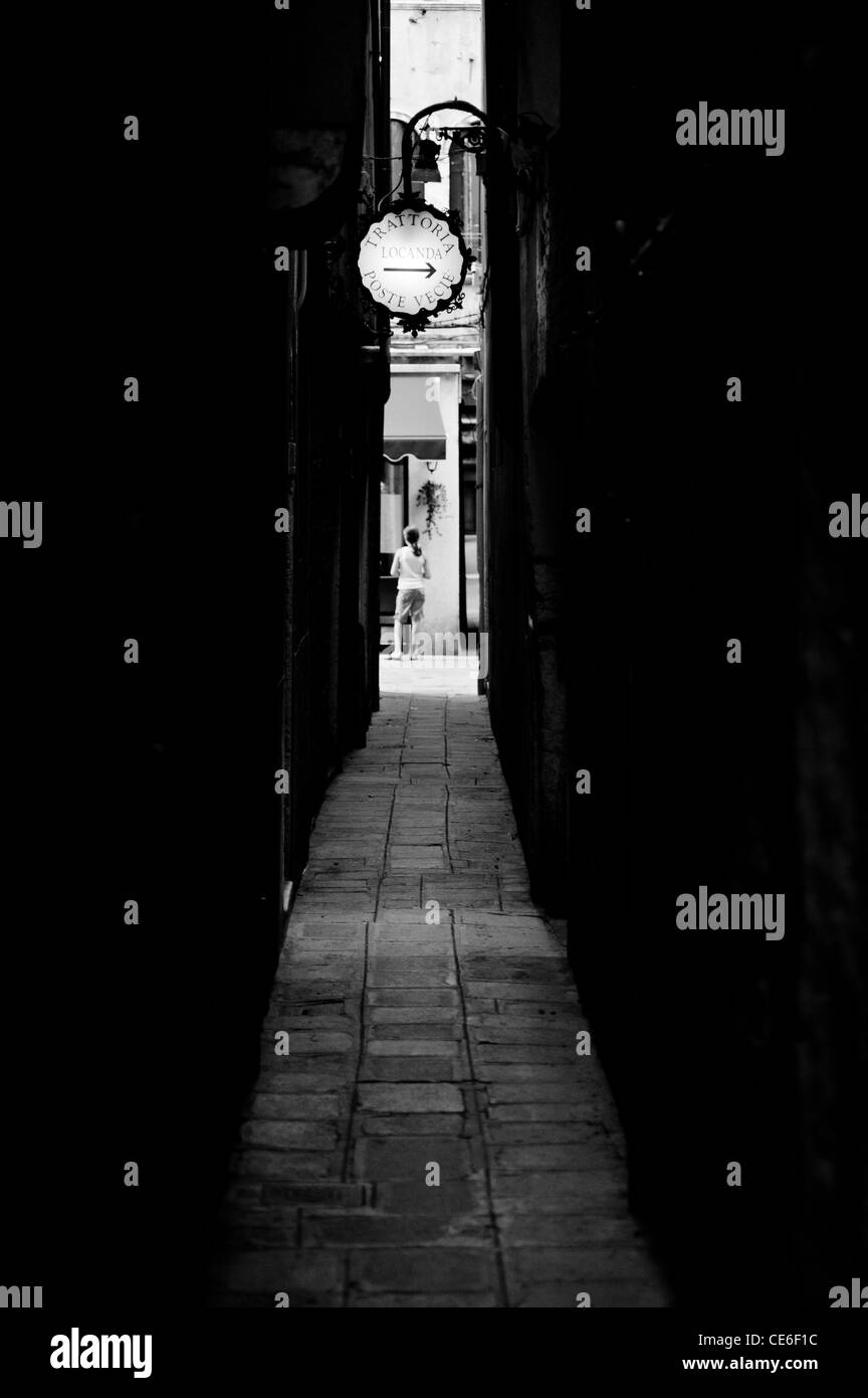 narrow street restaurant Stock Photo - Alamy