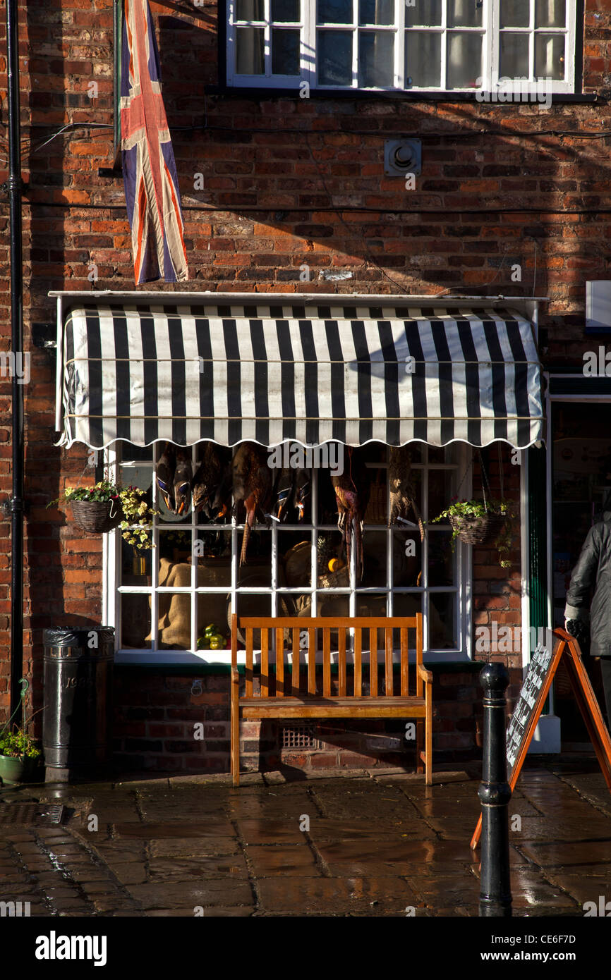 Traditional Butchers Shop with Game Hanging Outside Stock Photo - Alamy