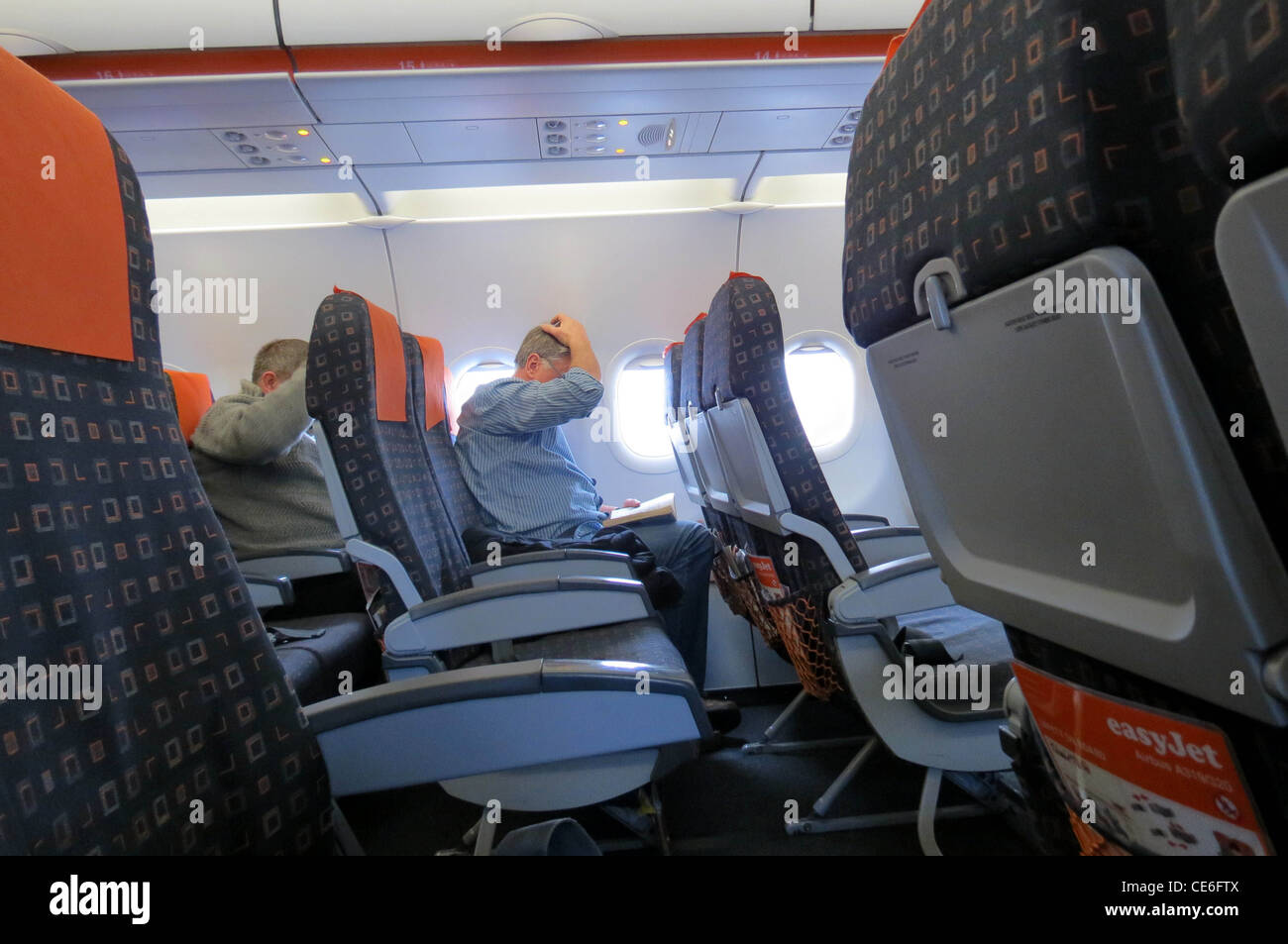 Passengers in cabin easyjet hi-res stock photography and images - Alamy