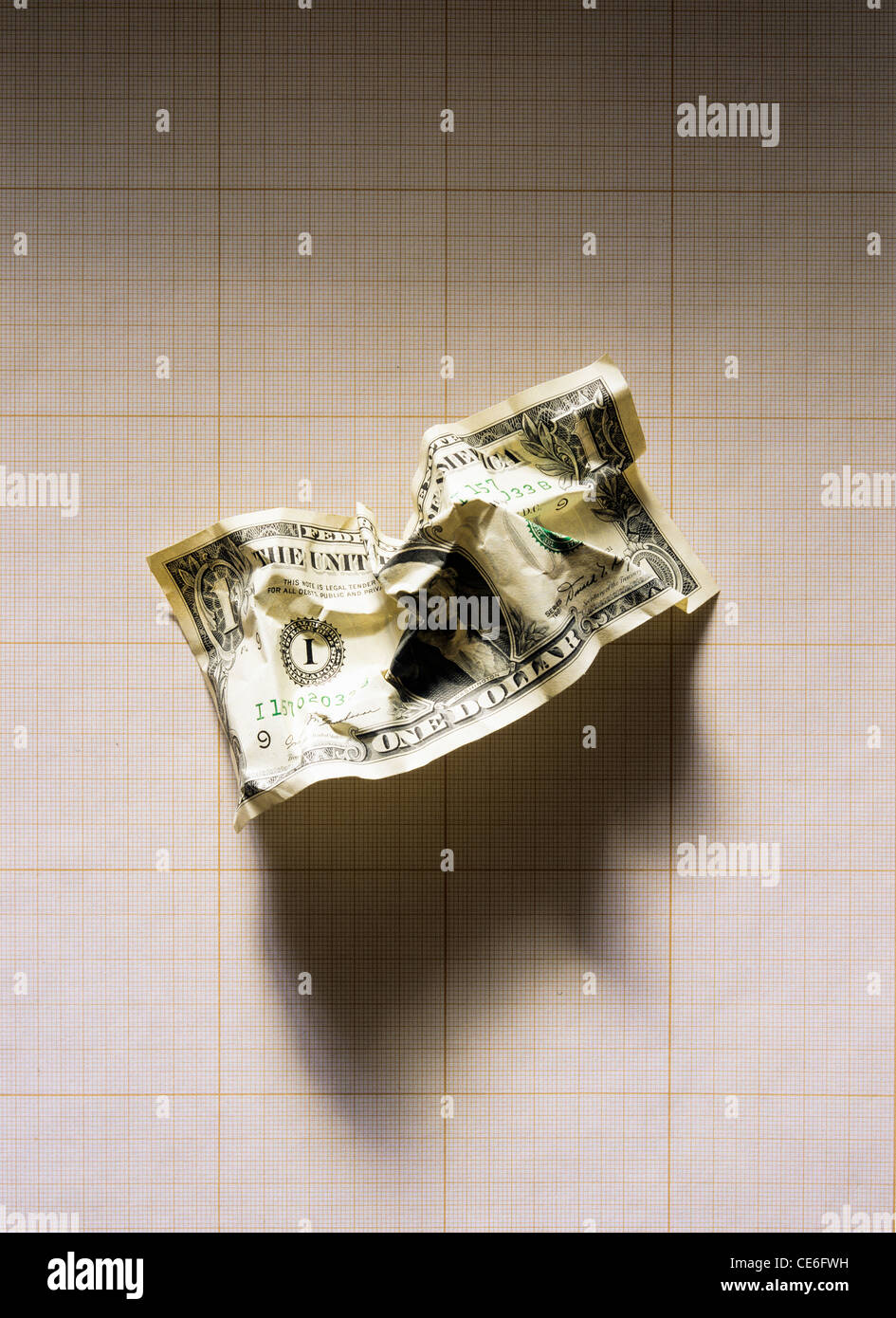 CRUMPLED 1 US DOLLAR BANKNOTE ON GRAPH PAPER Stock Photo - Alamy