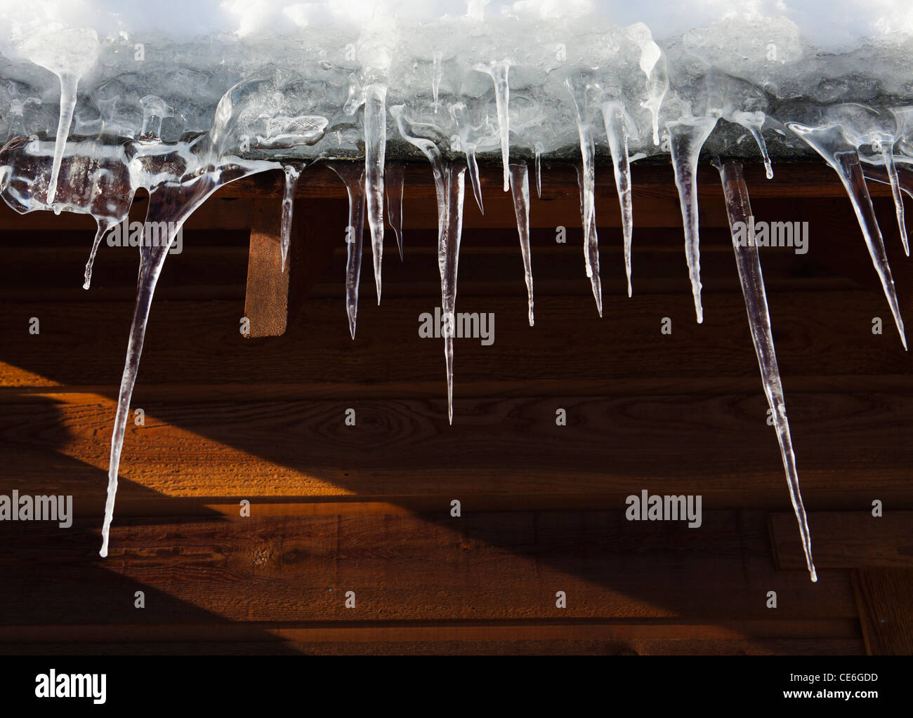 Ice hanging from roof hi-res stock photography and images - Alamy