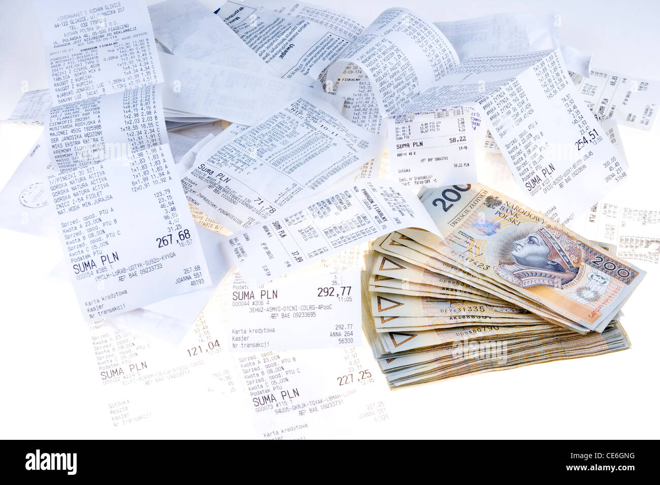 Money and receipts isolated on white background Stock Photo - Alamy
