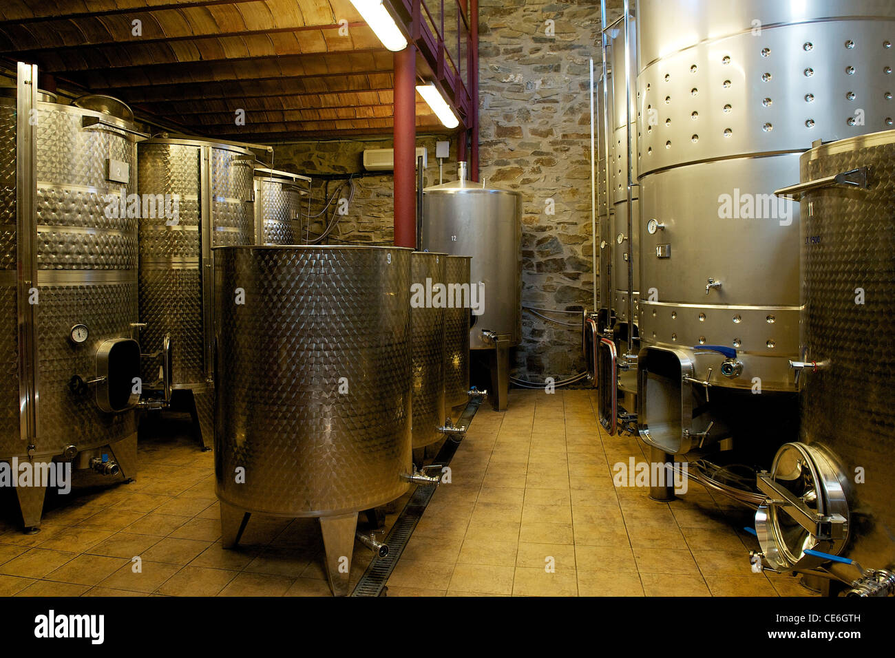 Steel wine vats in organic winery cellar, Spain Stock Photo - Alamy