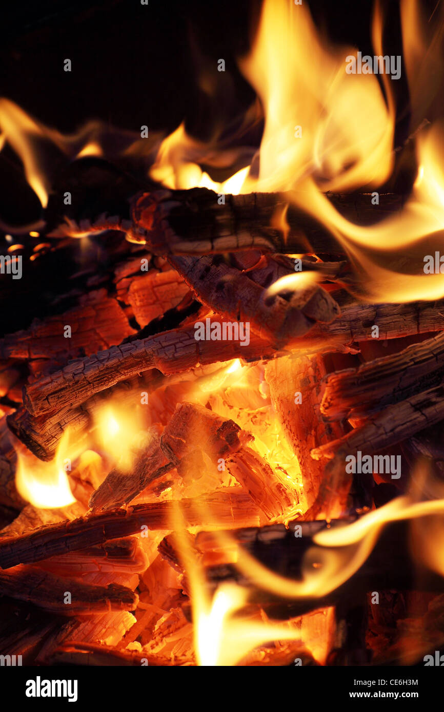 Close-up of fire and flames on a black background Stock Photo - Alamy