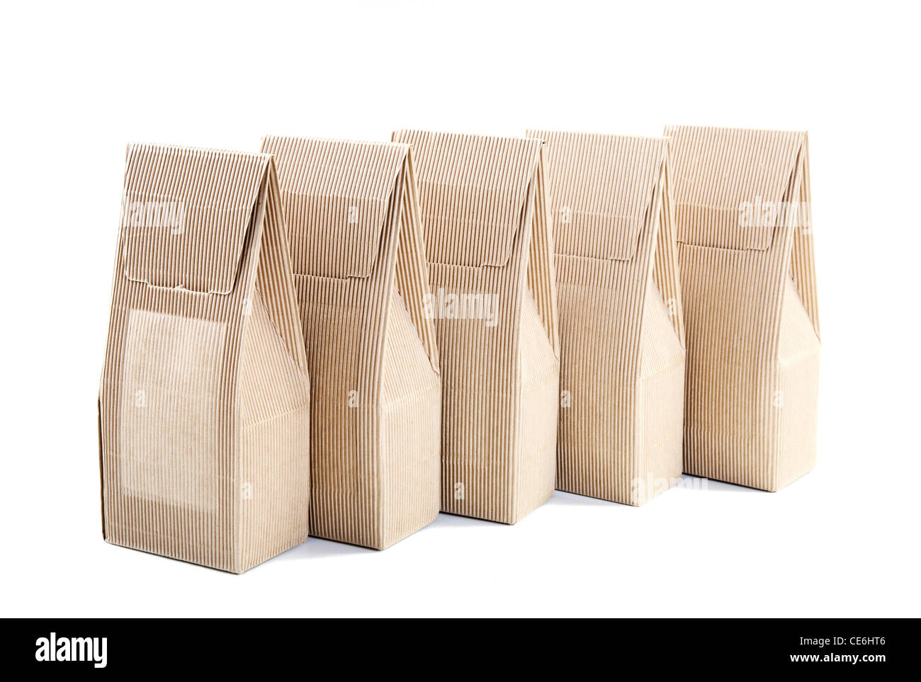 row of boxes from the goffered cardboard isolated on a white background ...