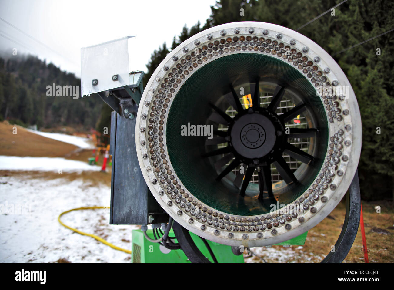 Color shot of a snow cannon on a slope Stock Photo - Alamy