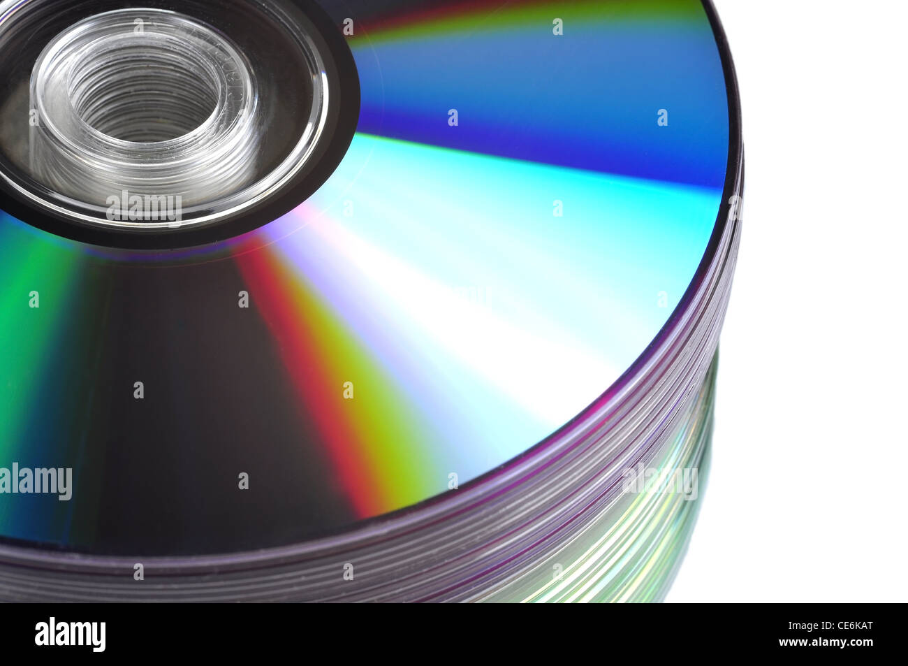 Close up view of a CD/DVD stack on a mirror Stock Photo - Alamy
