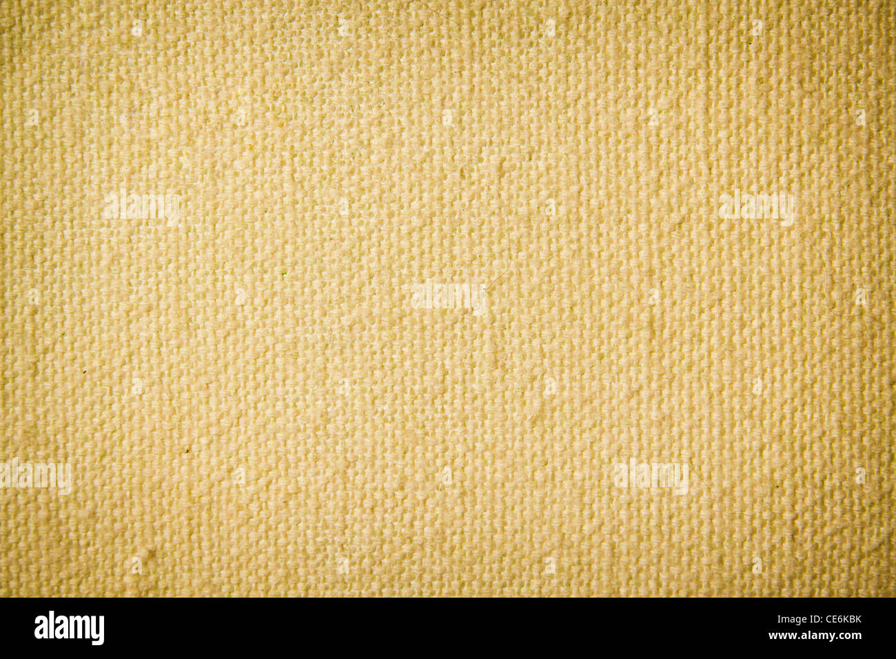 Old yellow canvas background Stock Photo - Alamy