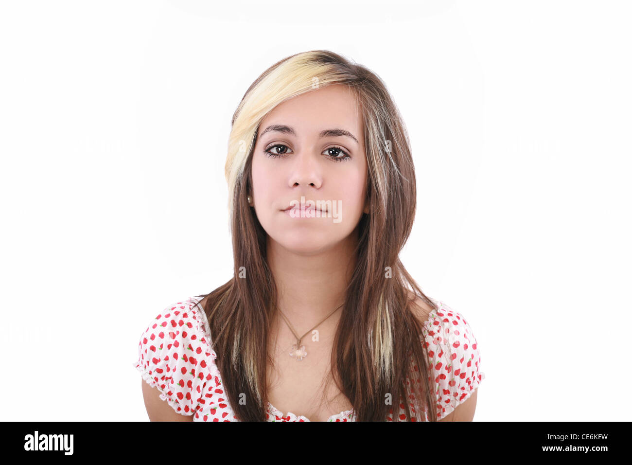 Young serious attractive woman looking into the camera Stock Photo - Alamy