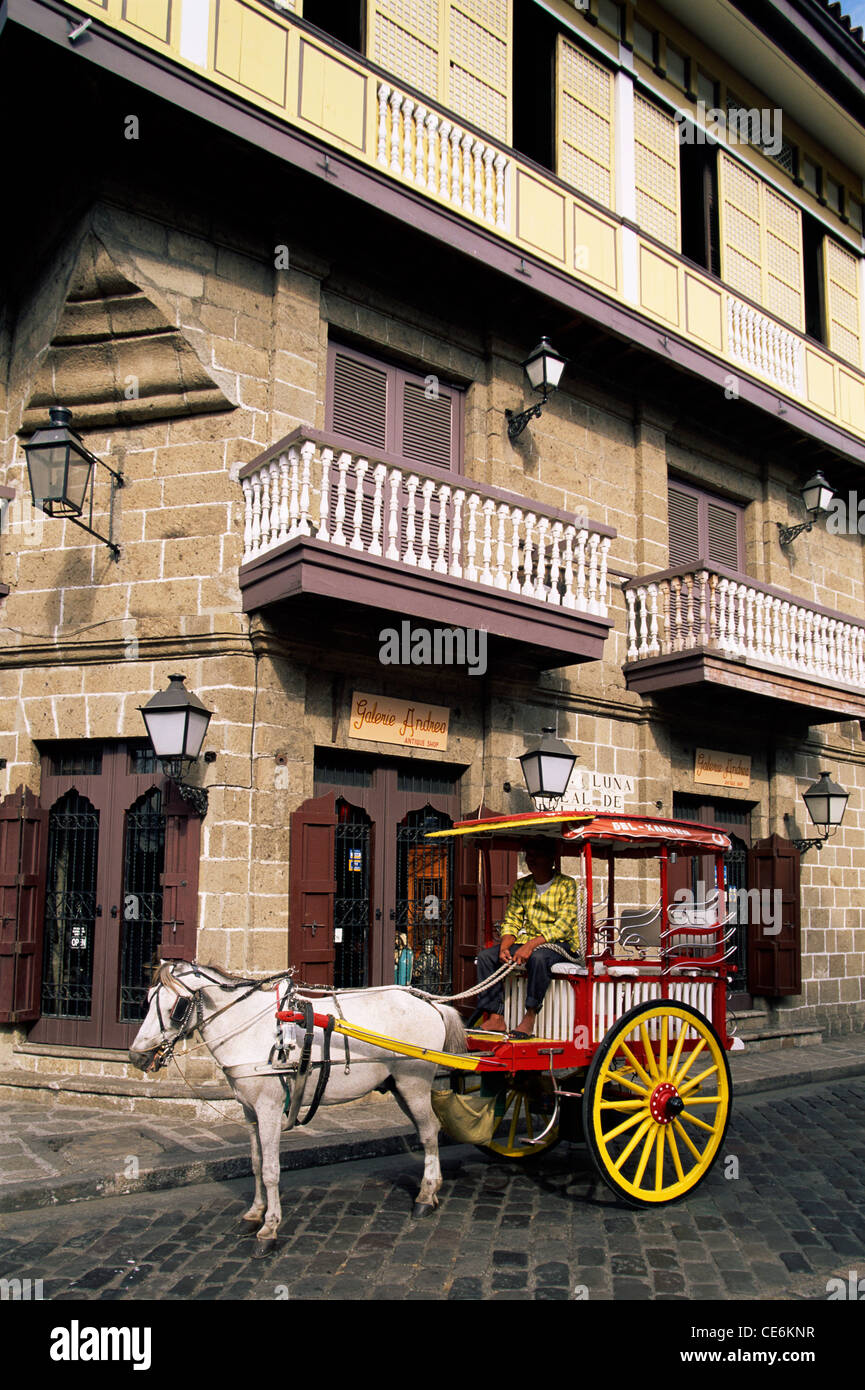 Philippines,Manila,Calesa or Horse-drawn Carriage and Spanish Colonial ...
