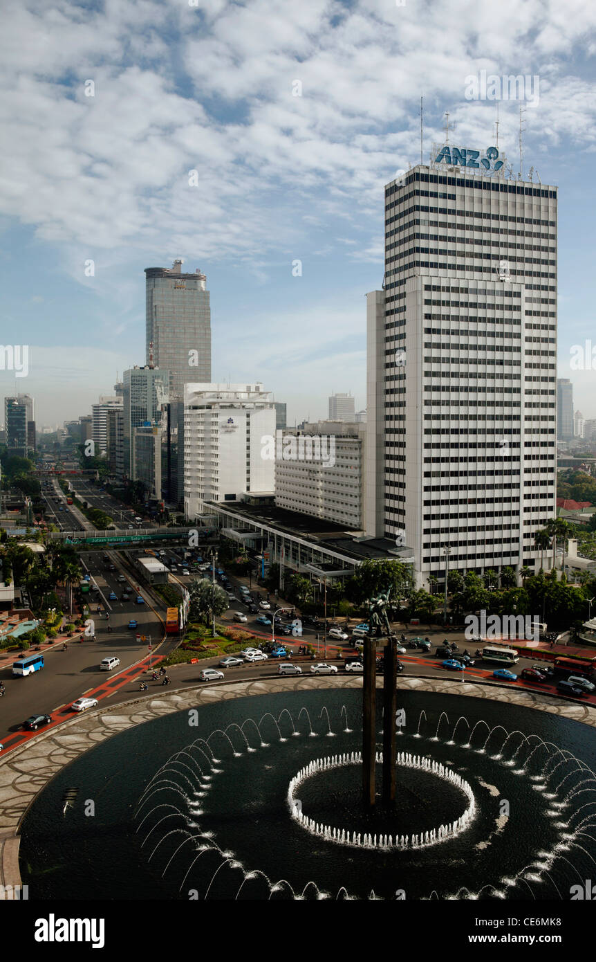 Welcome Monument and buildings along Jalan Thamrin, Jakarta Stock Photo ...