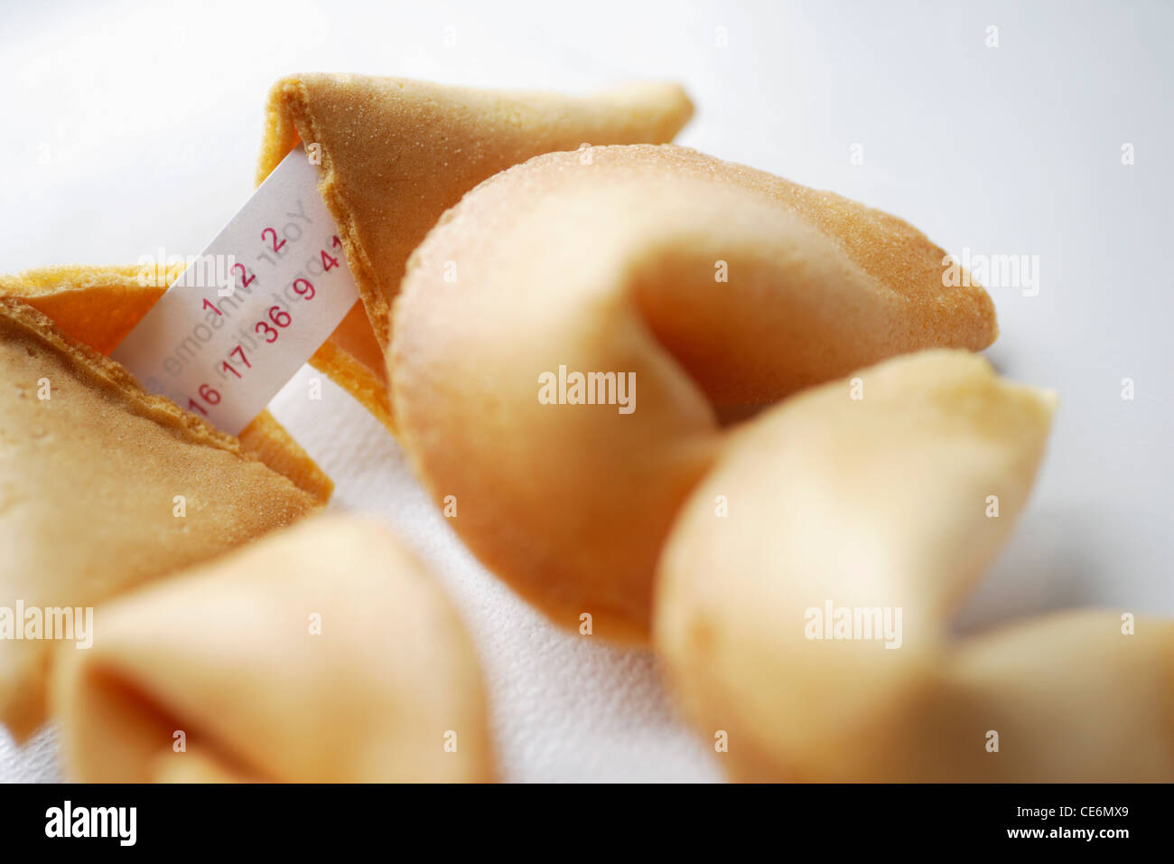 close up of fortune in fortune cookies Stock Photo - Alamy