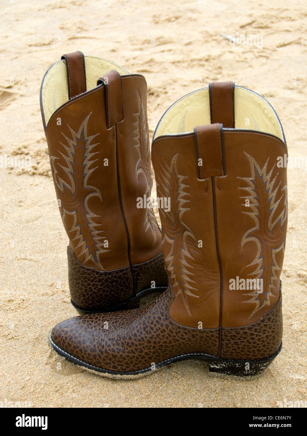 Leather Cowboy style boots, complete with engraving Stock Photo - Alamy