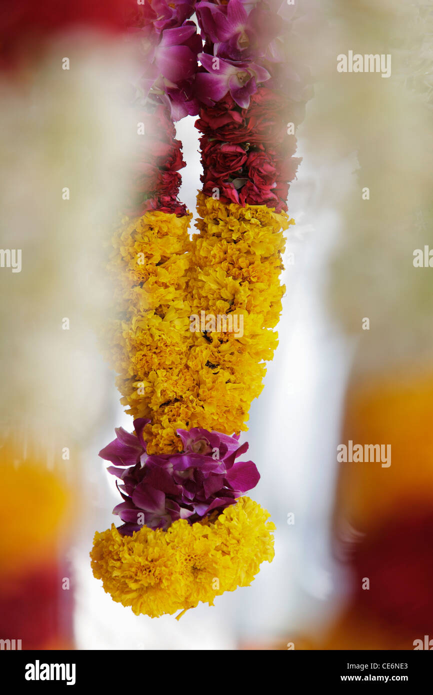 Hanging flower garland hi-res stock photography and images - Alamy