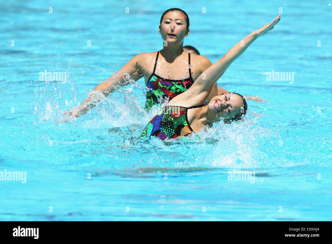 Swimmers Performing in Swimming Pool, Synchronized Swimming Stock Photo ... Swimmers Performing in Swimming Pool, Synchronized Swimming Stock Photo ...