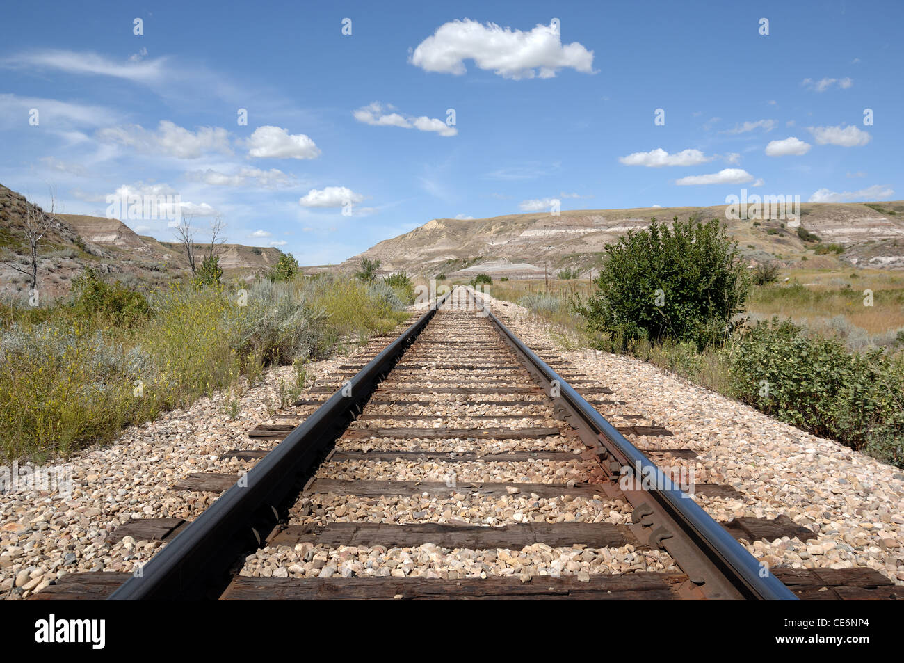 Train tracks located in the badlands of Alberta, Canada, near ...