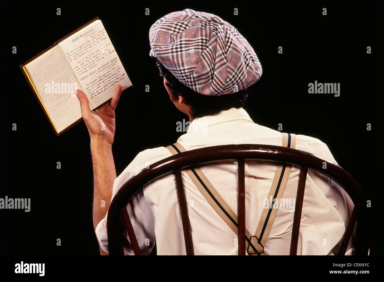 Man sitting reading book backview hi-res stock photography and images ...