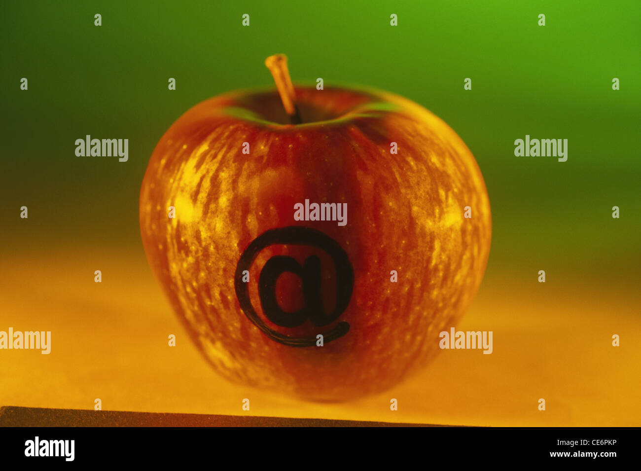 @ computer sign At The Rate of sign on Apple Stock Photo - Alamy