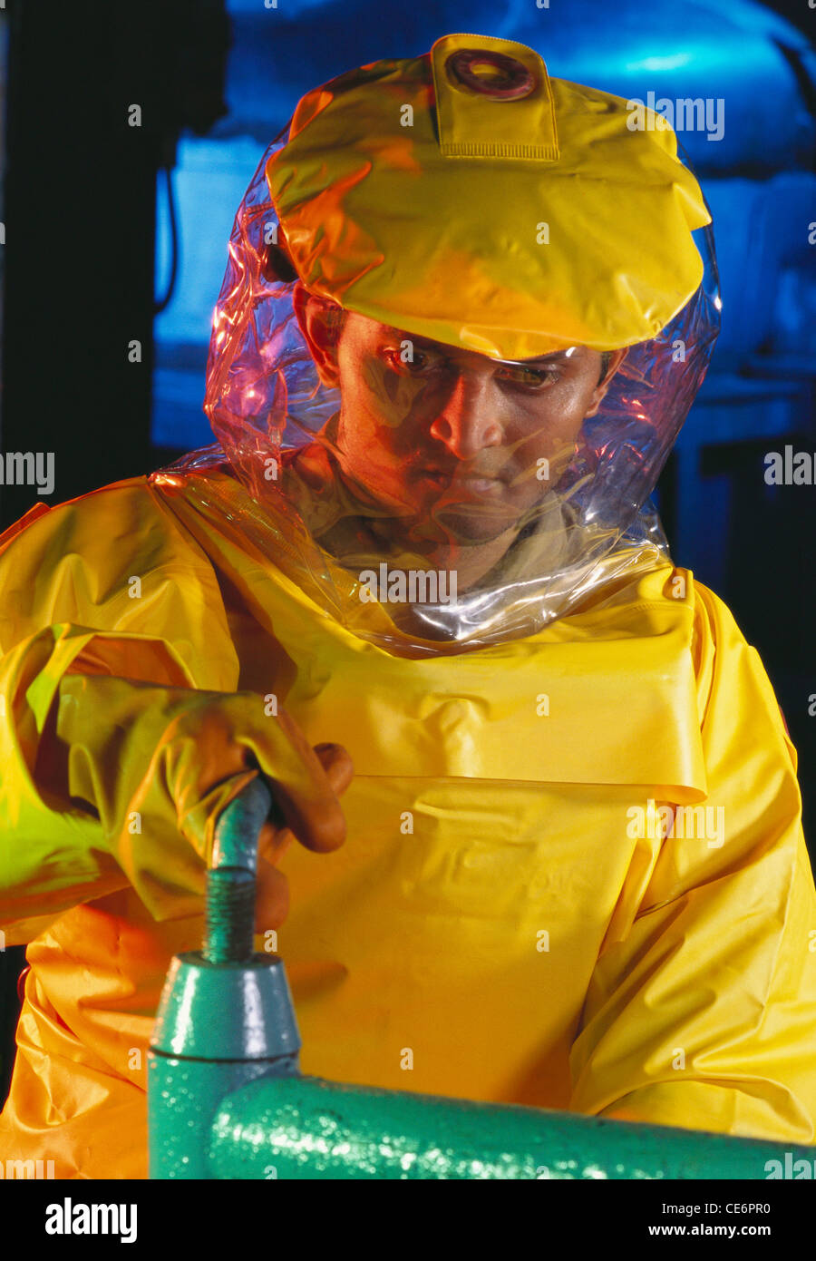 Indian worker wearing safety dress working in chemical factory ; india ...