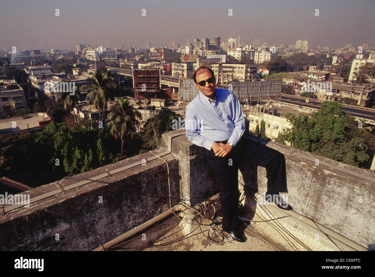 Architect Hafeez Contractor ; Indian architect standing on rooftop ...