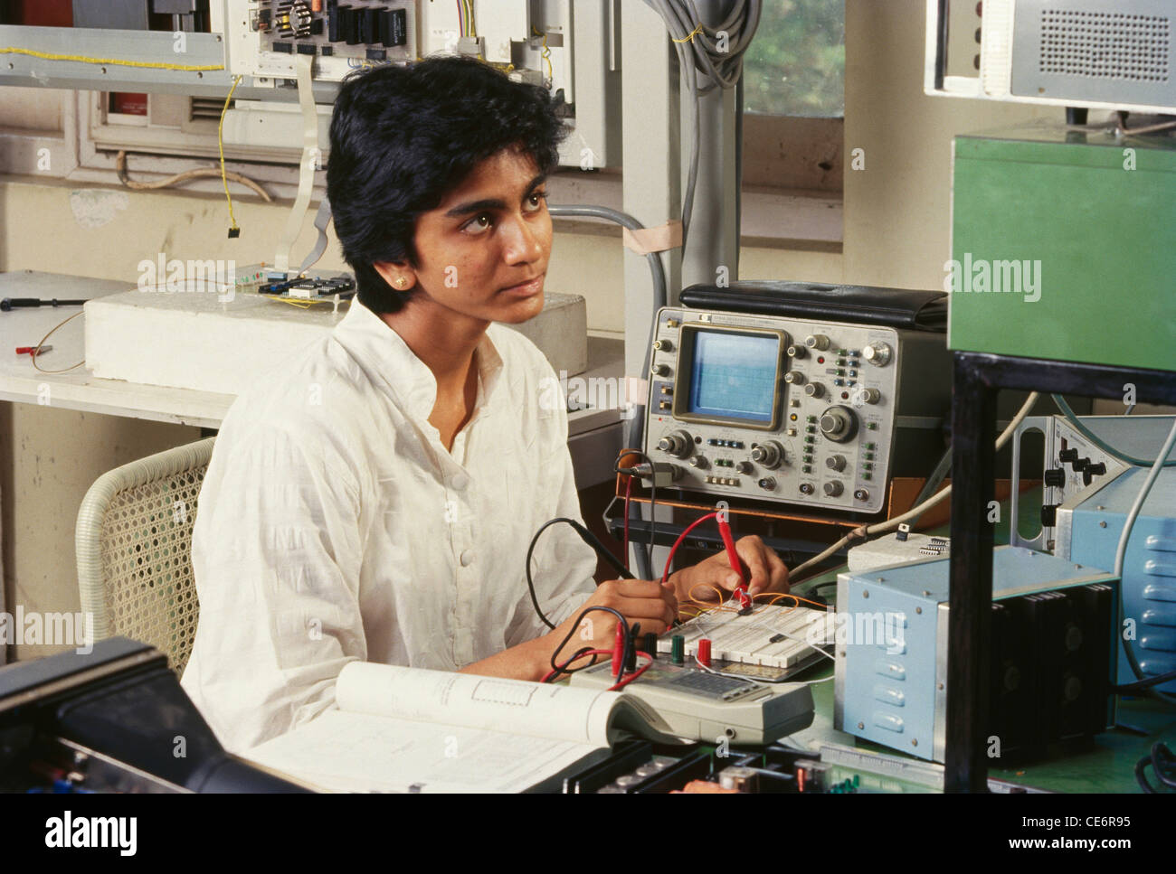 Indian woman working in electronic industry ; india ; asia Stock Photo ...