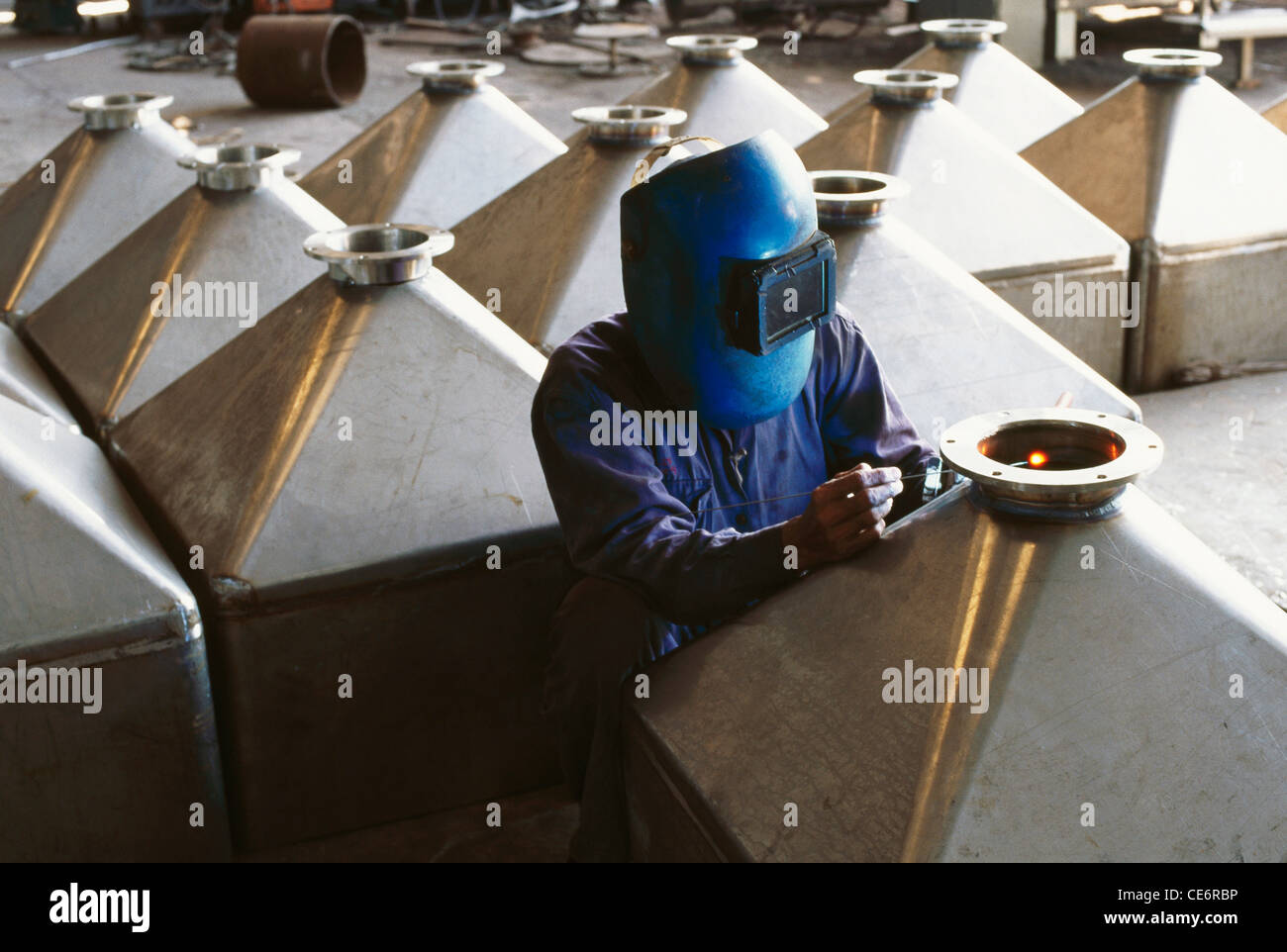 Indian man welding in hi-res stock photography and images - Alamy