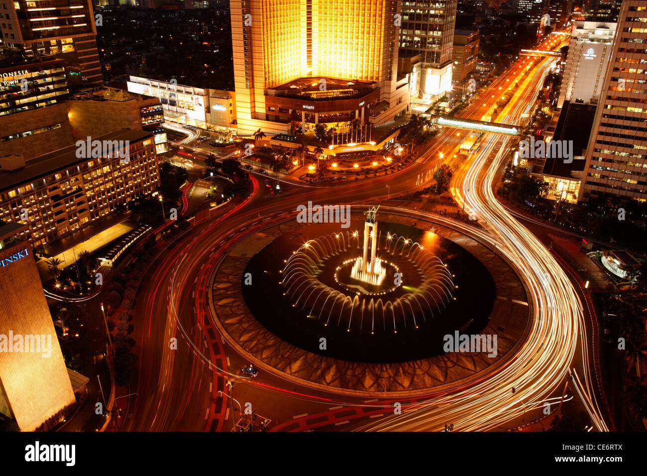 Evening view of Hotel Indonesia roundabout, Welcome Monument along ...