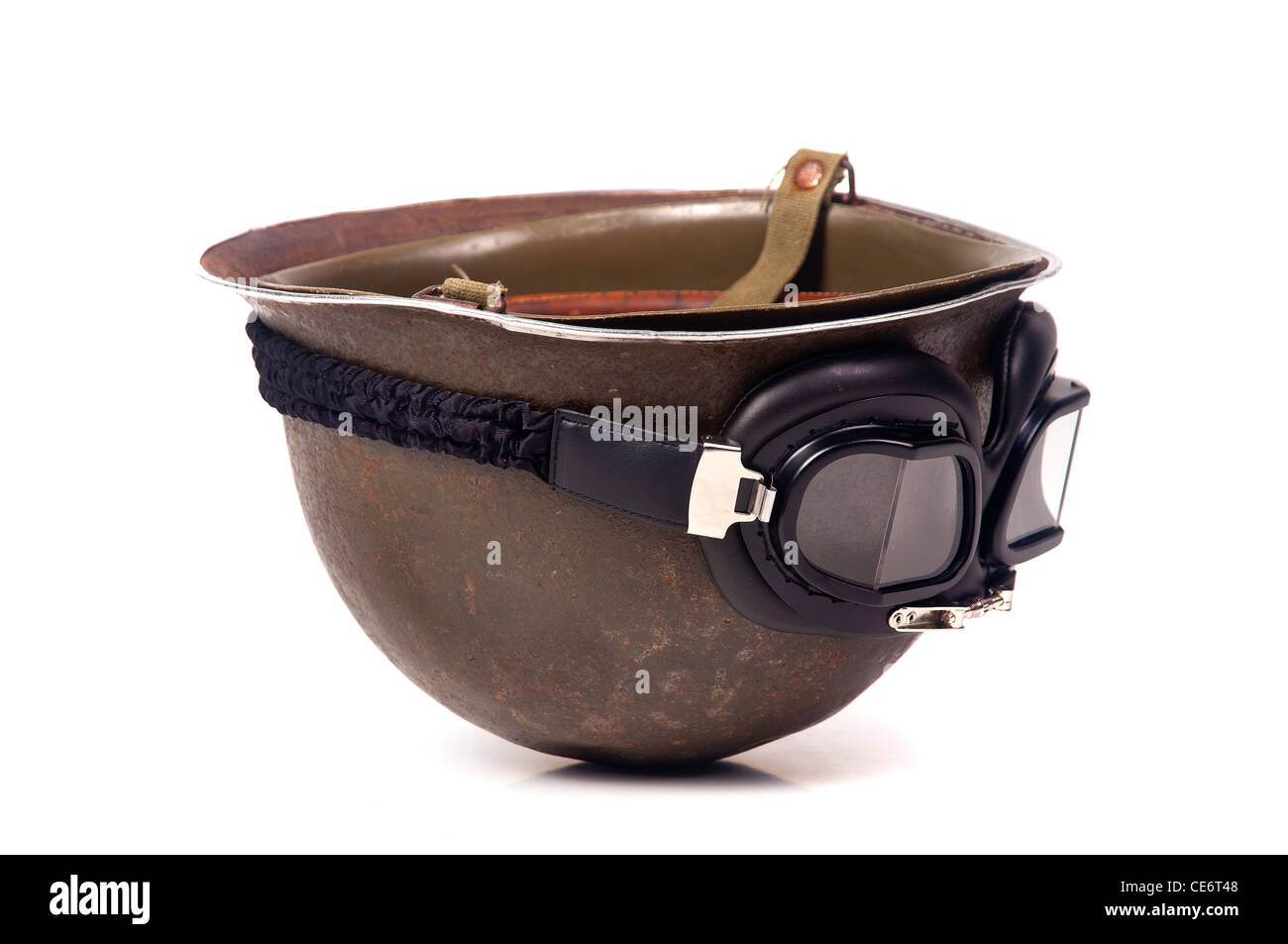 Old soldiers helmet with goggles isolated in white Stock Photo - Alamy