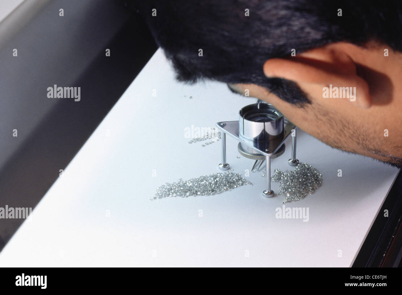 Man with crystal mineral stone hi-res stock photography and images - Alamy