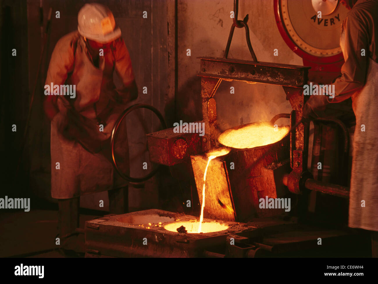 Steel pouring from furnace in mould in steel factory india Stock Photo ...