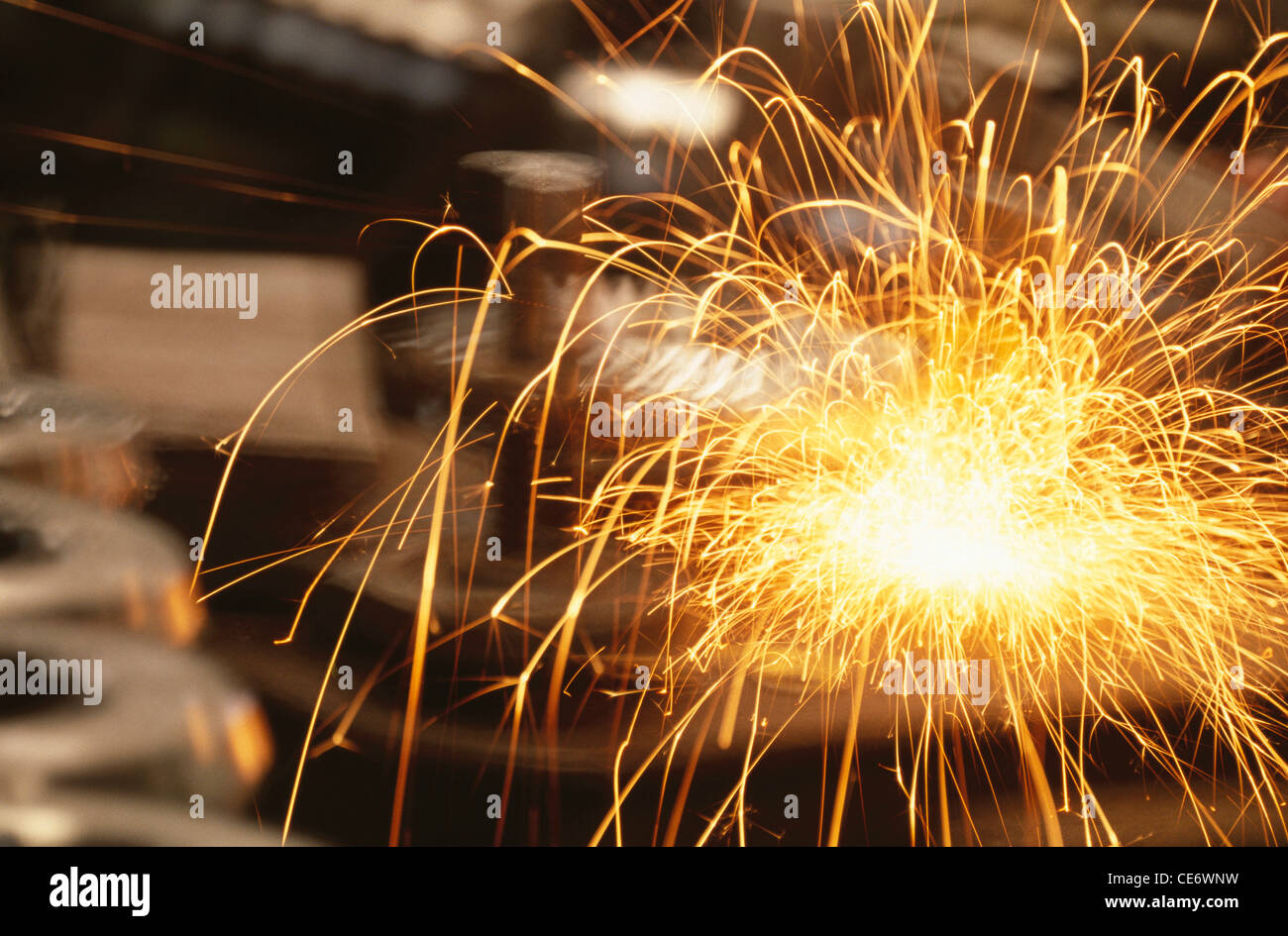 Welding sparks ; engineering factory ; india ; asia Stock Photo - Alamy