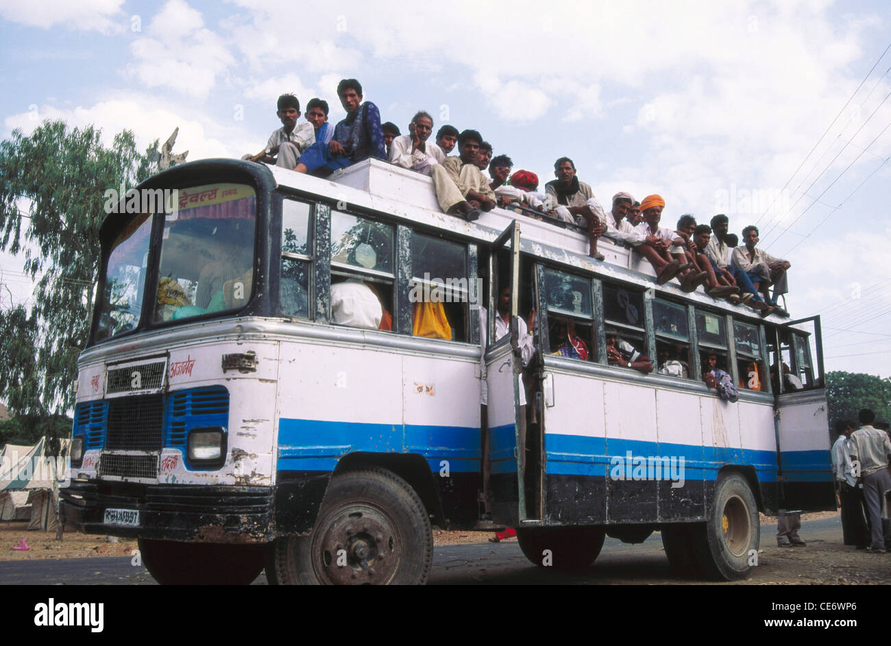 people sitting on top of bus pushkar fair rajasthan india Stock Photo ...