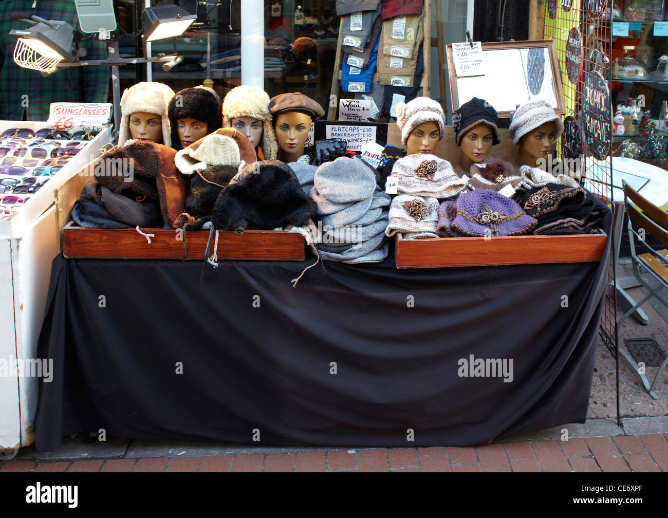 Market stall selling hats hi-res stock photography and images - Alamy