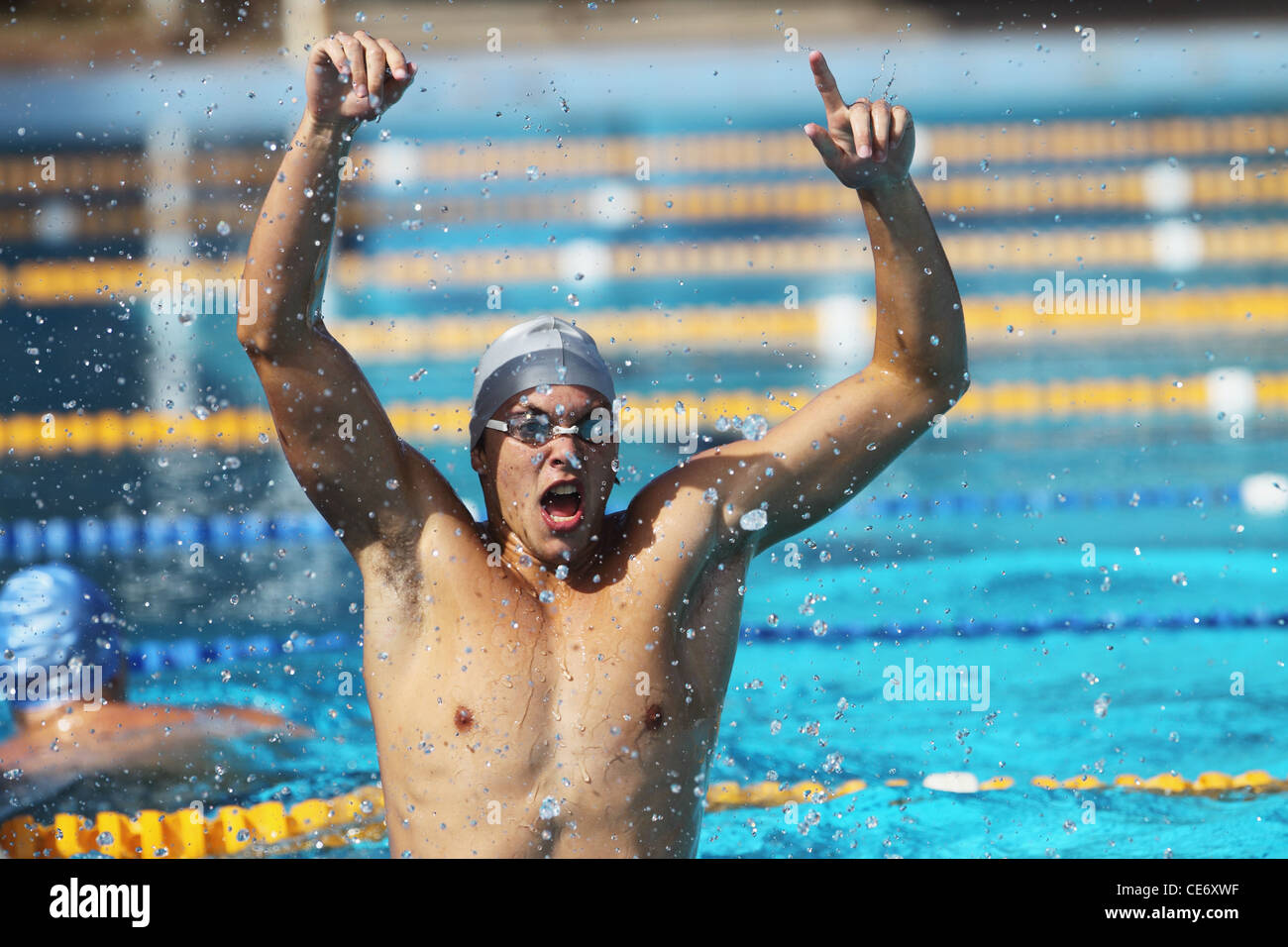 Swimmer Celebrating Success Stock Photo - Alamy