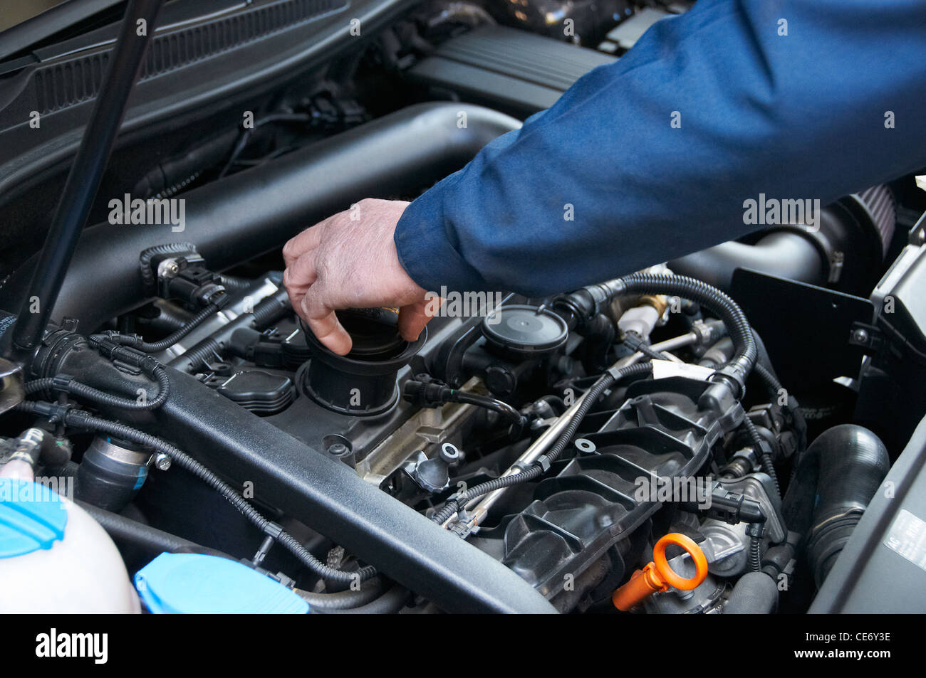 mechanic repairs a car in a garage Stock Photo - Alamy