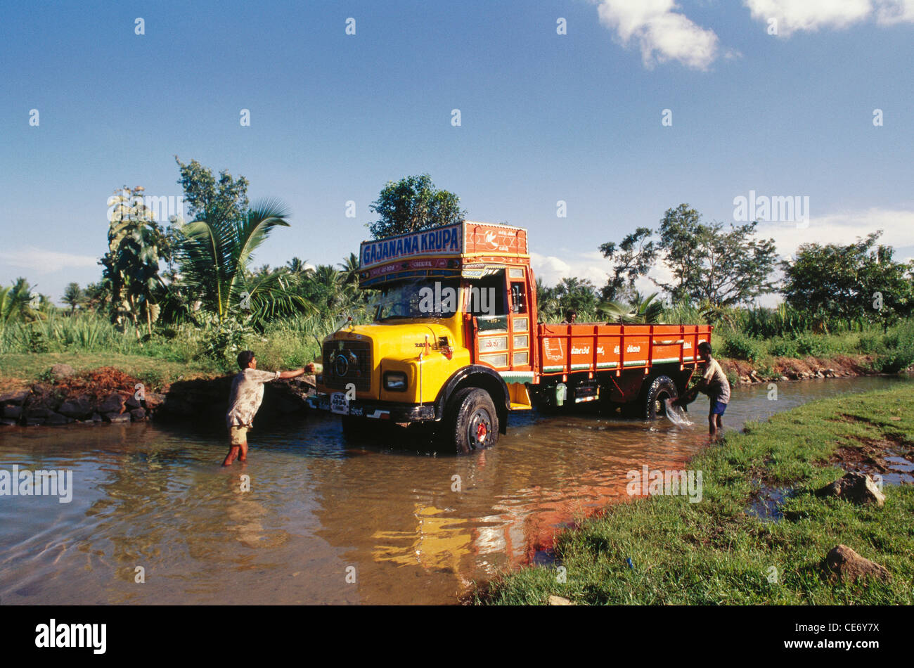 indian men washing truck in pond ; karnataka ; india ; asia Stock Photo ...